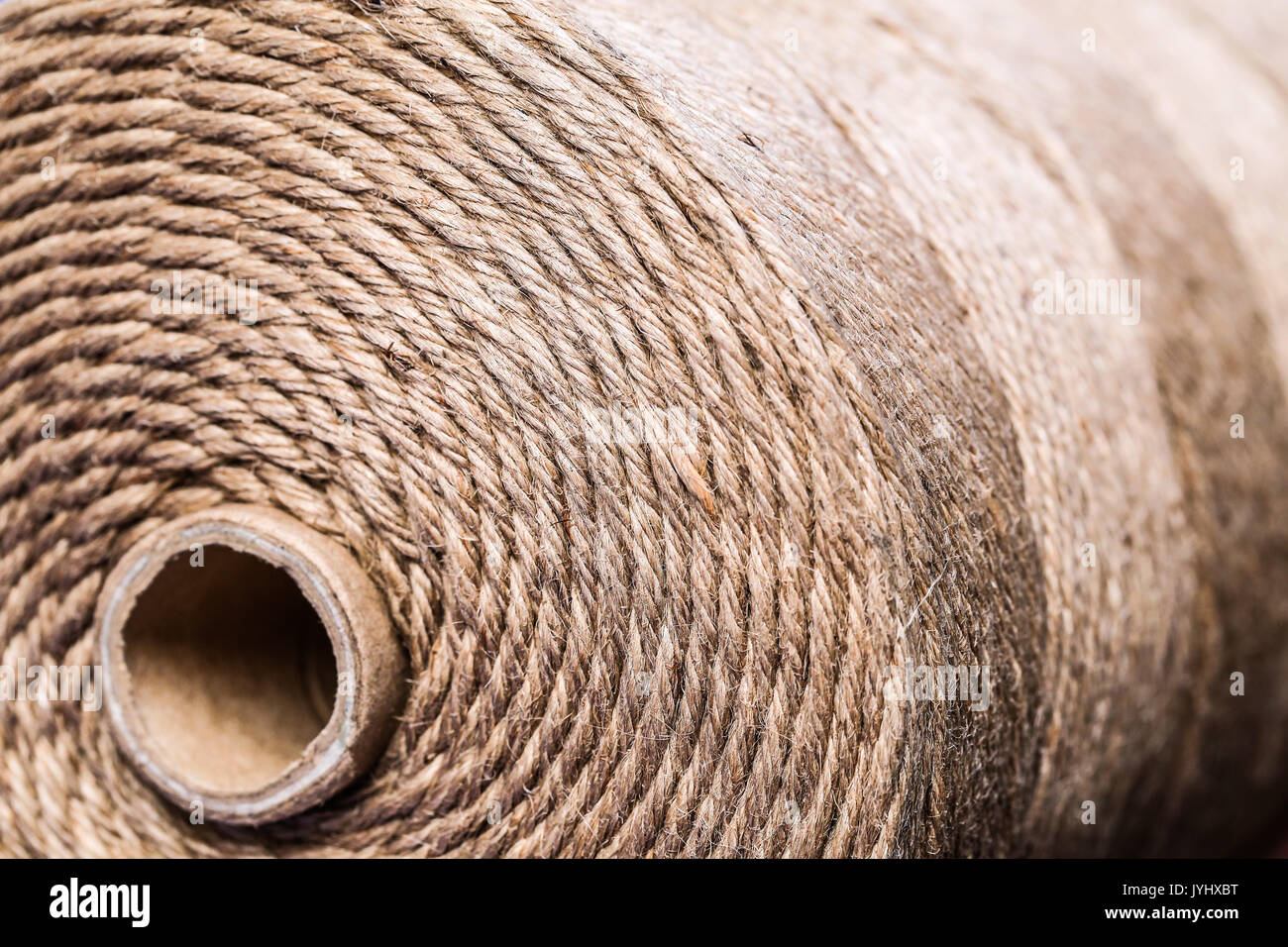 rolled up brown rope background with core Stock Photo - Alamy