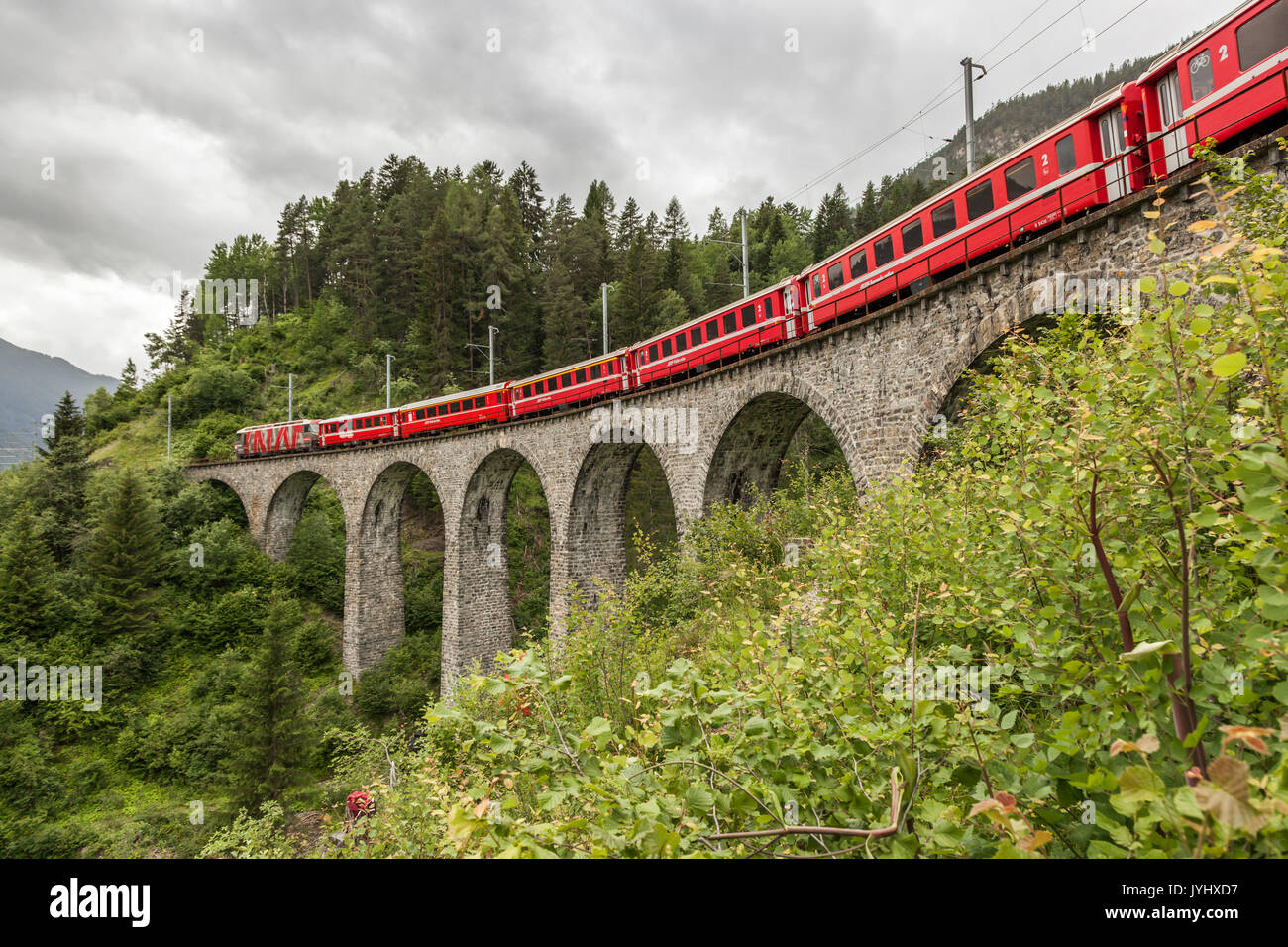 Red Bernina Express train, Filisur, Graubunden, Switzerland Stock Photo ...