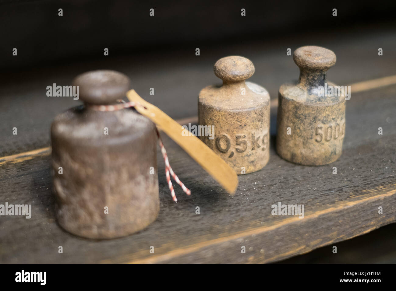 old weights on work bench - vintage kg weights on wooden background ...