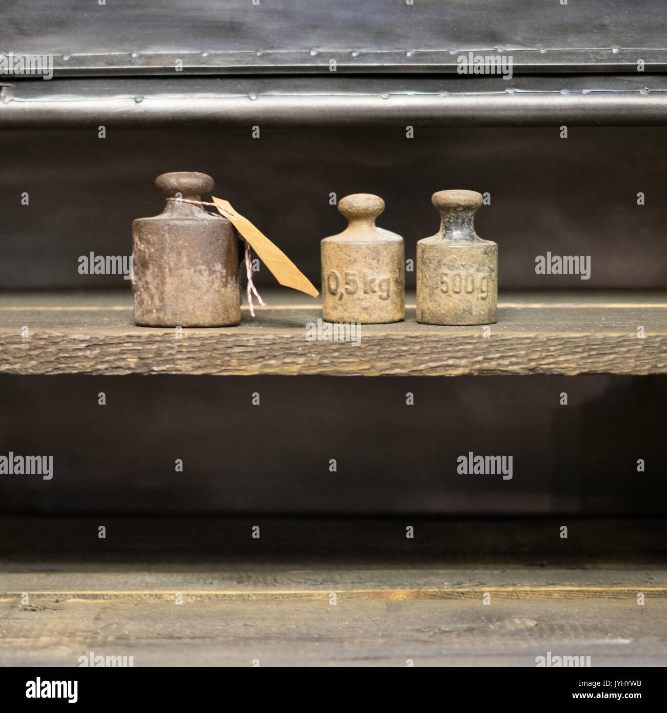 old weights on work bench - vintage kg weights on wooden background ...