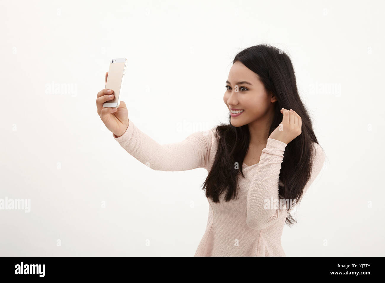 malay woman selfie on the white background Stock Photo - Alamy