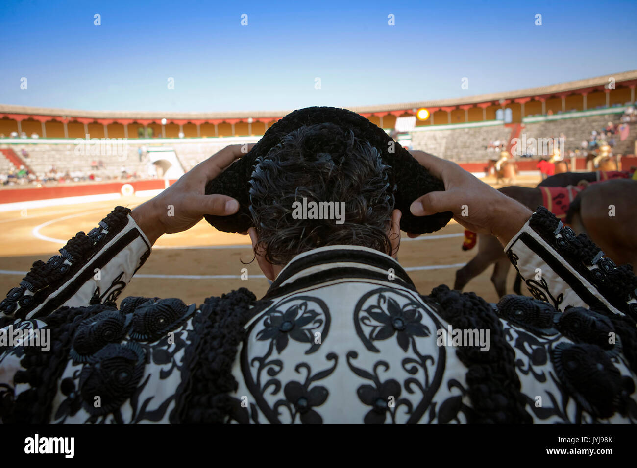 Bullfighter by contacting the montera during a bullfight, Spain Stock ...