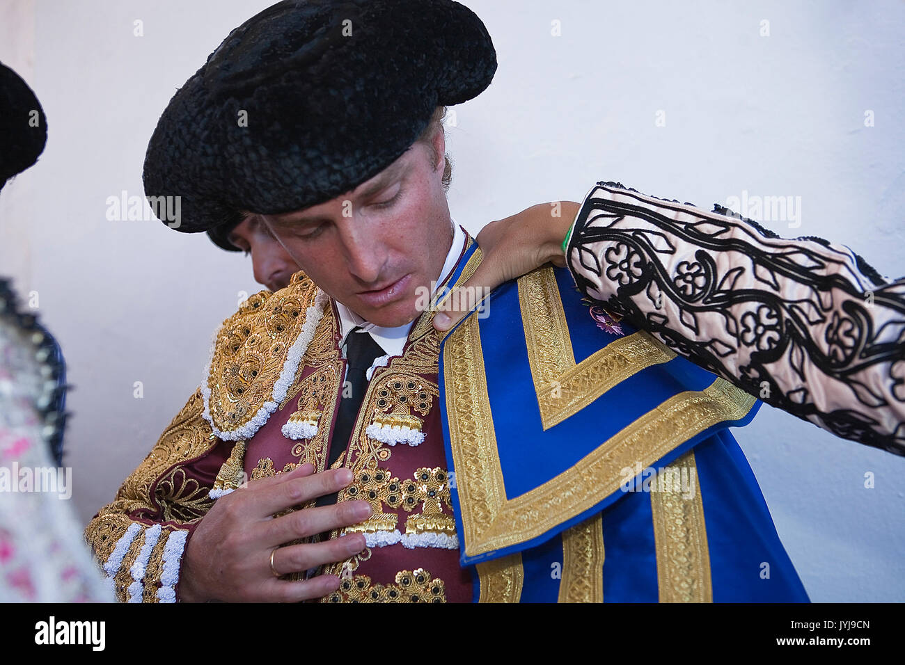 The spanish bullfighter Jose Luis Moreno getting dressed for the ...