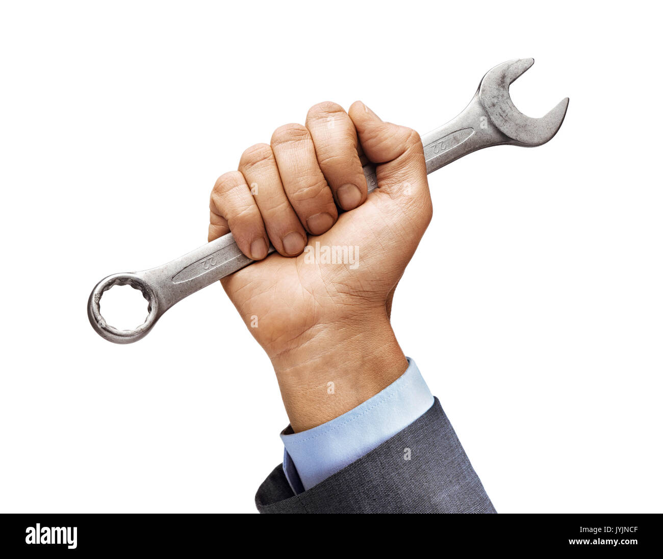 Man's hand in a suit holds a wrench isolated on white background. Close ...