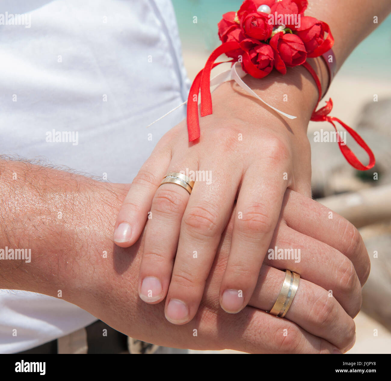 Newly married couple holding hands hi-res stock photography and images ...