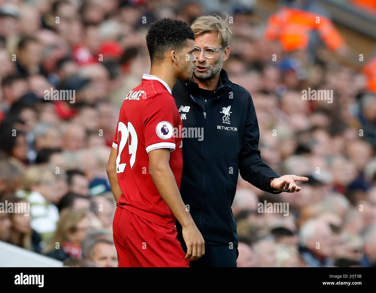 Liverpool manager Jurgen Klopp speaks with Dominic Solanke before he is ...