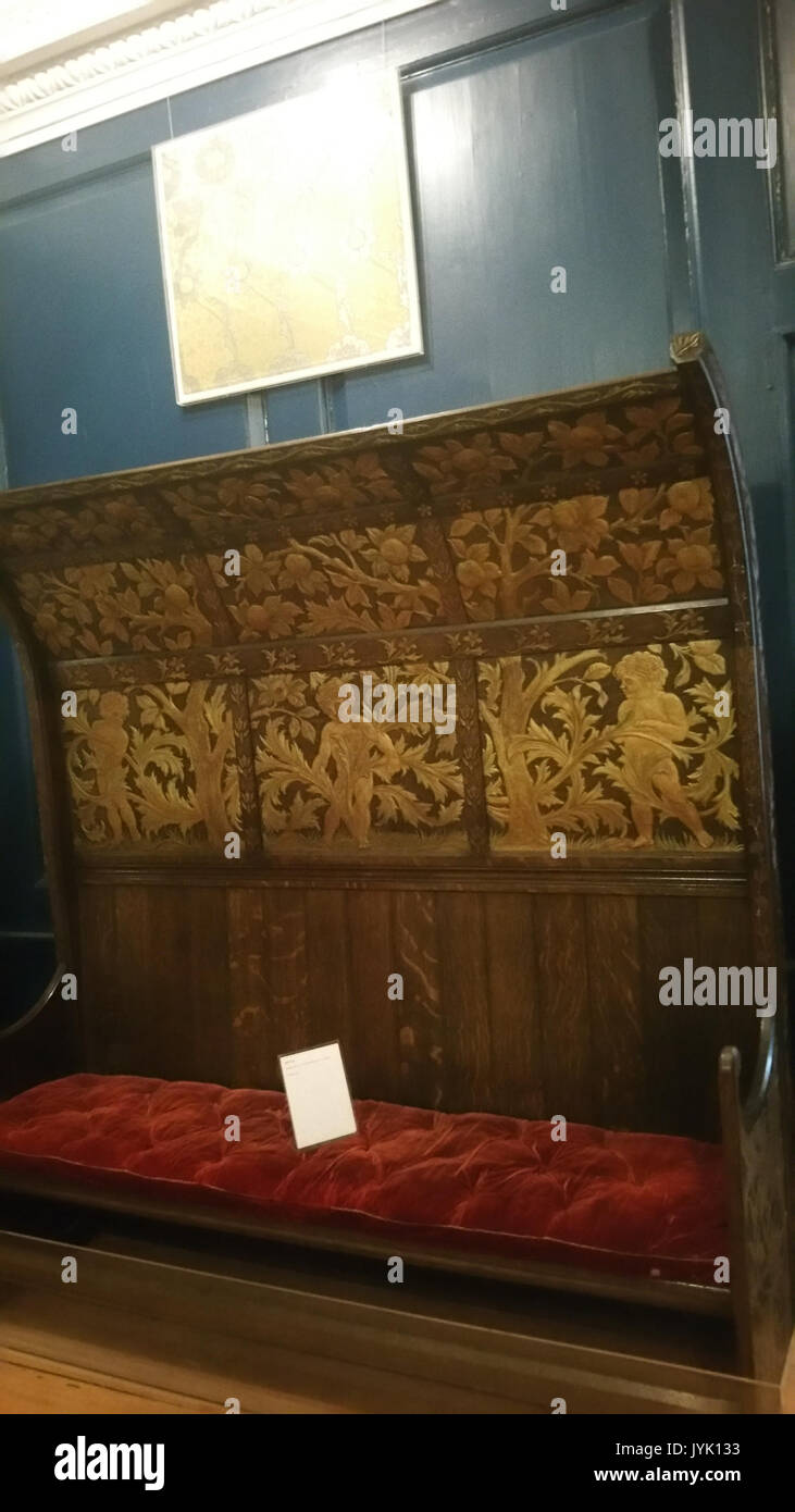 A wooden carved bench by William Morris 02 Stock Photo - Alamy