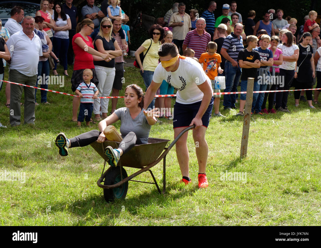 Wheelbarrow race High Resolution Stock Photography and Images - Alamy