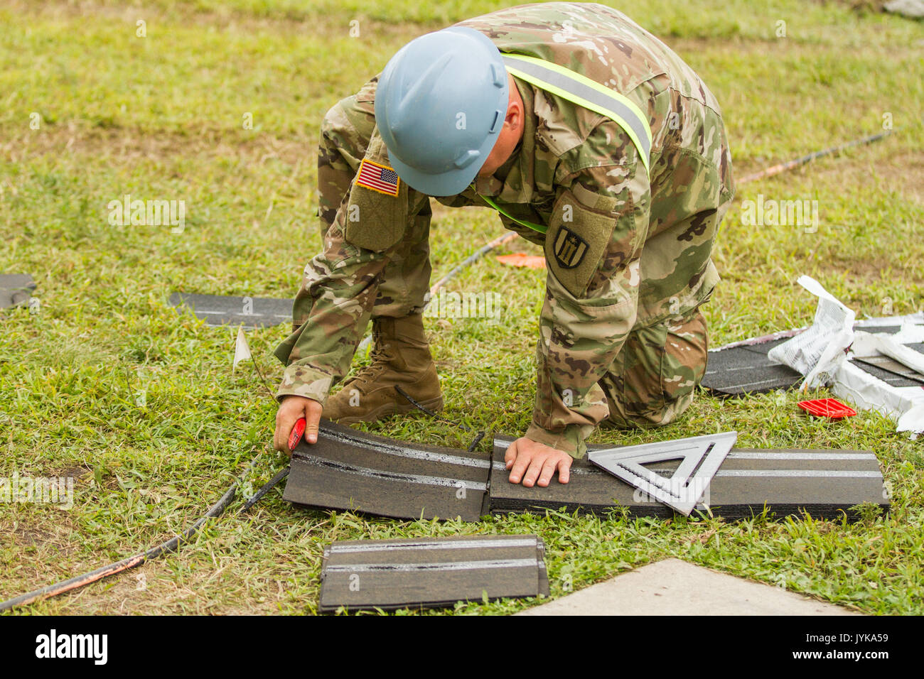 U.S. Army Sgt. Kenneth Killingbeck, 486th Engineering Company, prepares ...