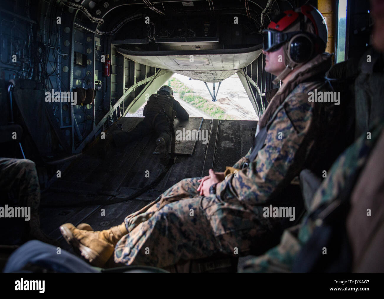 A U.S. Marine Corps crew chief with Marine Heavy Helicopter Squadron ...