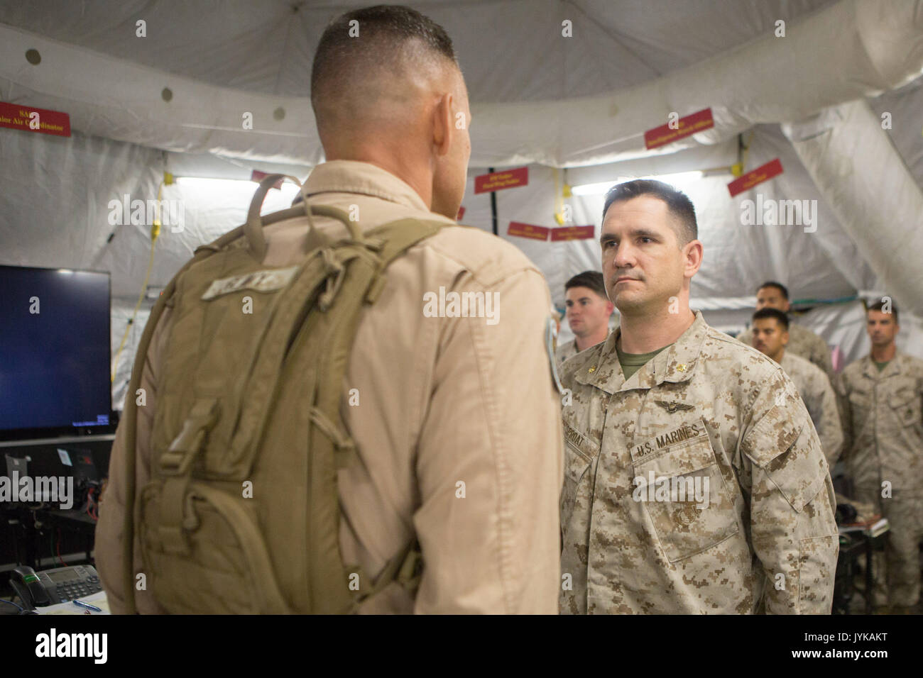 U.S. Marine Corps Maj. Matthew Sproat, right, future operations officer ...