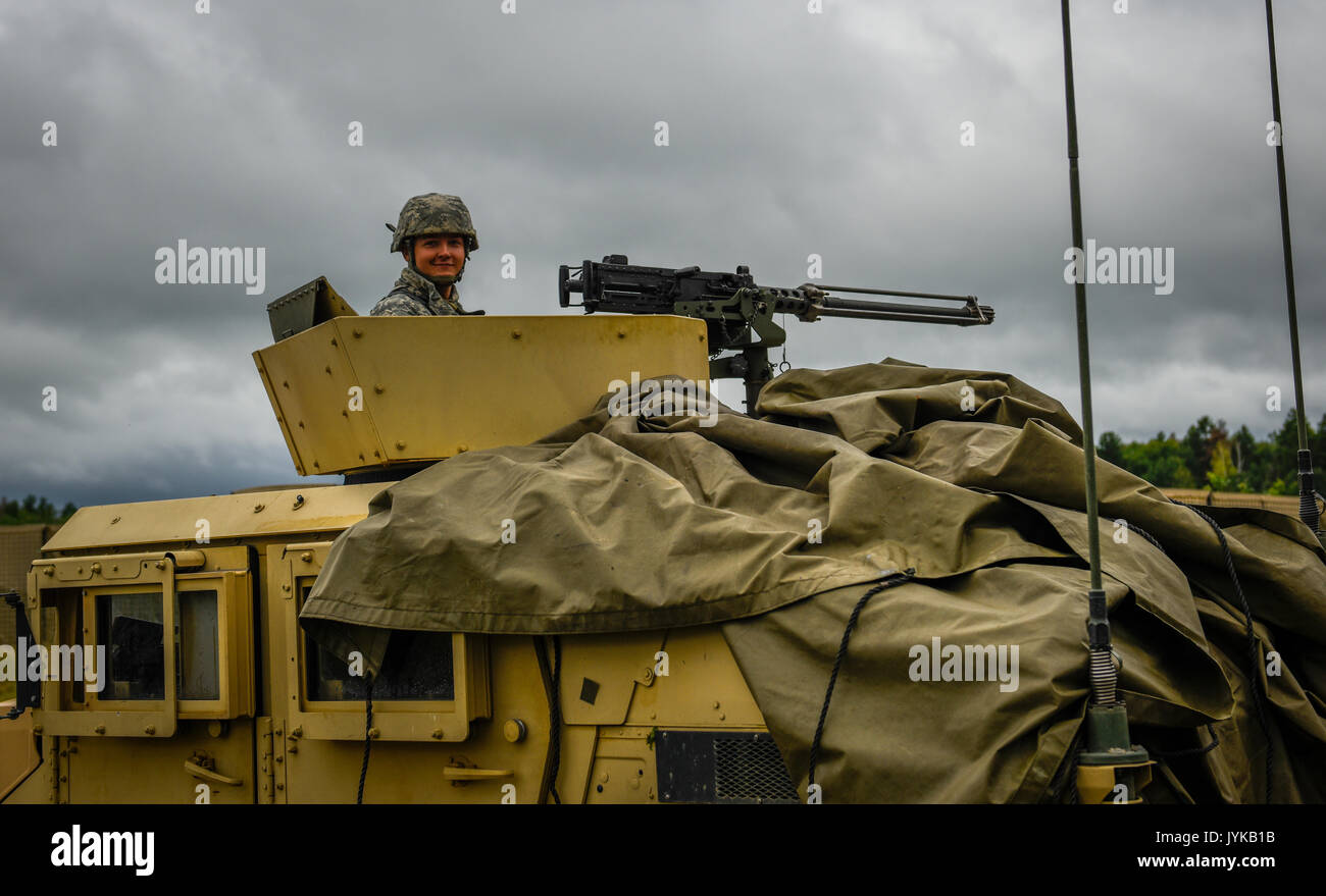 Spc. Gruber, 34th Military Police Company, waits for a call as part of ...