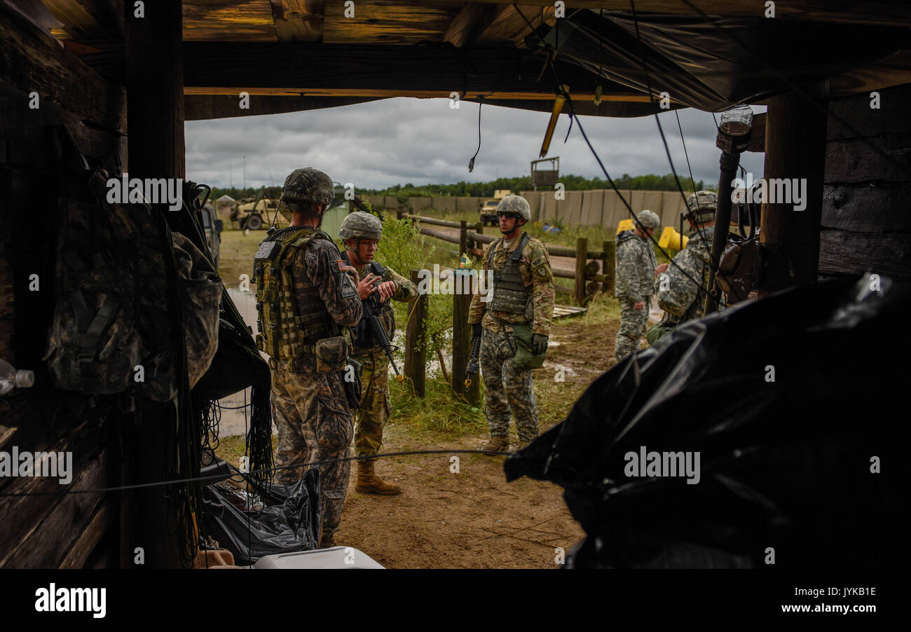 Soldiers with the 34th Military Police Company man the entry control ...