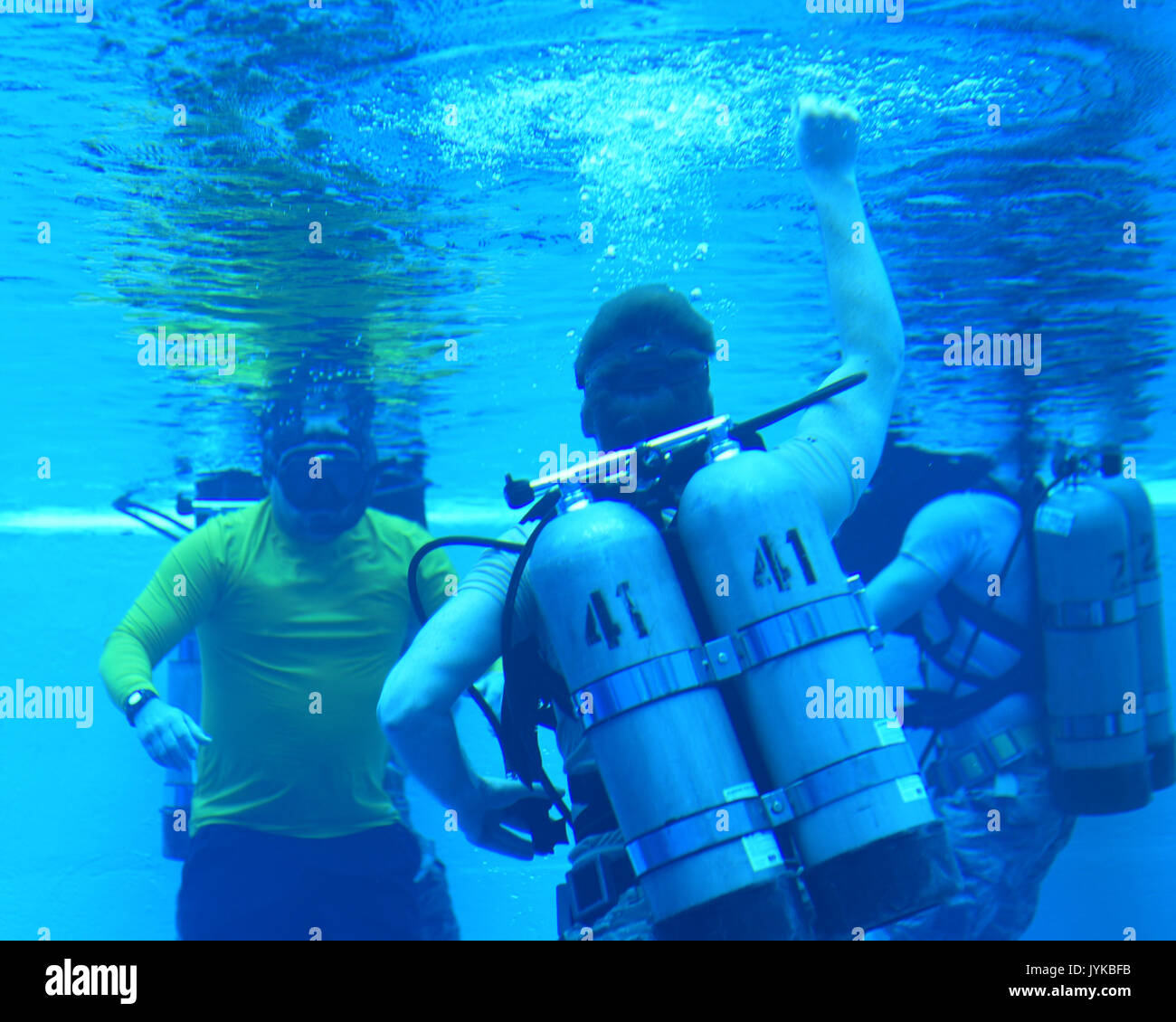 A U.S. Air Force diving student approaches the surface while his ...