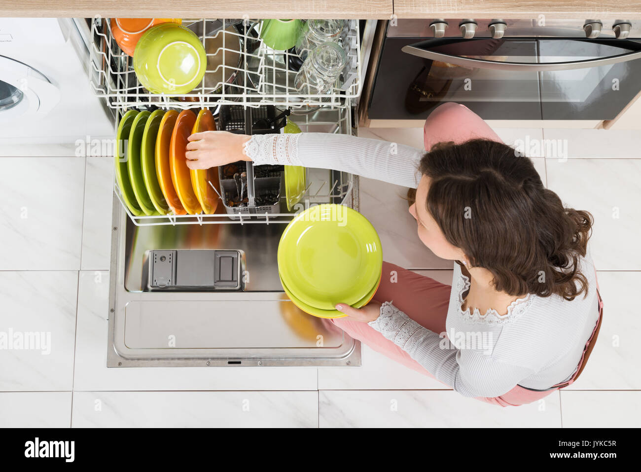 Woman doing housework hi-res stock photography and images - Alamy