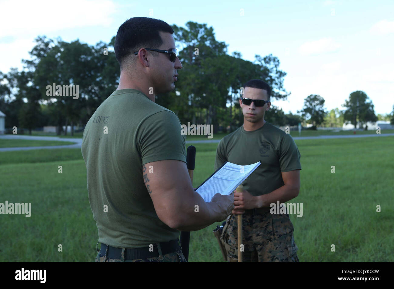 U.S. Marine Corps Staff Sgt. Luis Lopez, left, and 1st Lt. David ...