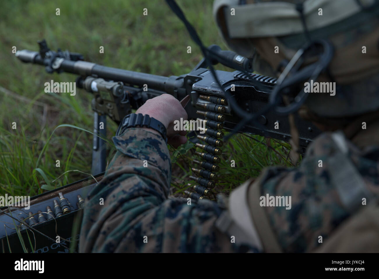 A U.S. Marine Corps machine gunner with Company Bravo, 1st Battalion ...