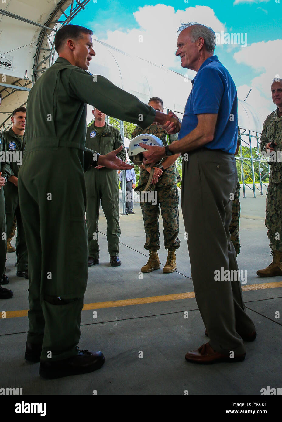 Lt. Col. Adam Levine presents Secretary of the Navy, Richard V. Spencer ...