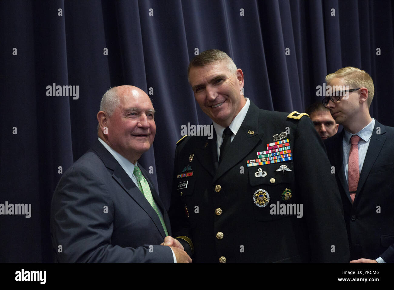 Sonny Perdue, left, 31st United States secretary of Agriculture, poses ...