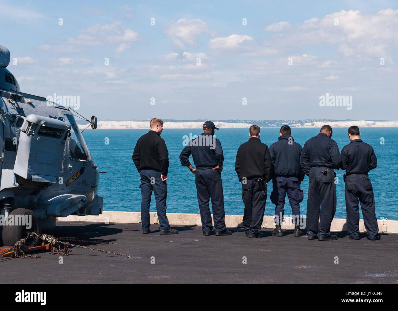 170811-N-ME396-037 ENGLISH CHANNEL (Aug. 11, 2017) Sailors look at the ...
