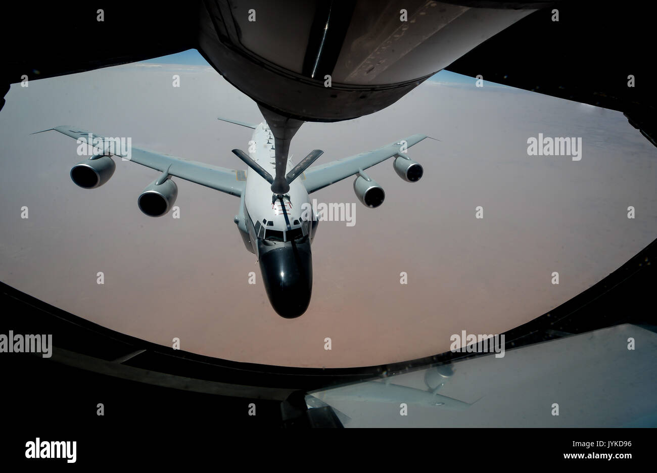 A RC-135V/W Rivet Joint receives fuel from a KC-135 Stratotanker ...