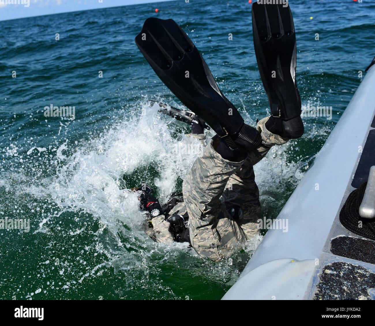 A U.S. Air Force diving student makes his initial dive during a ...