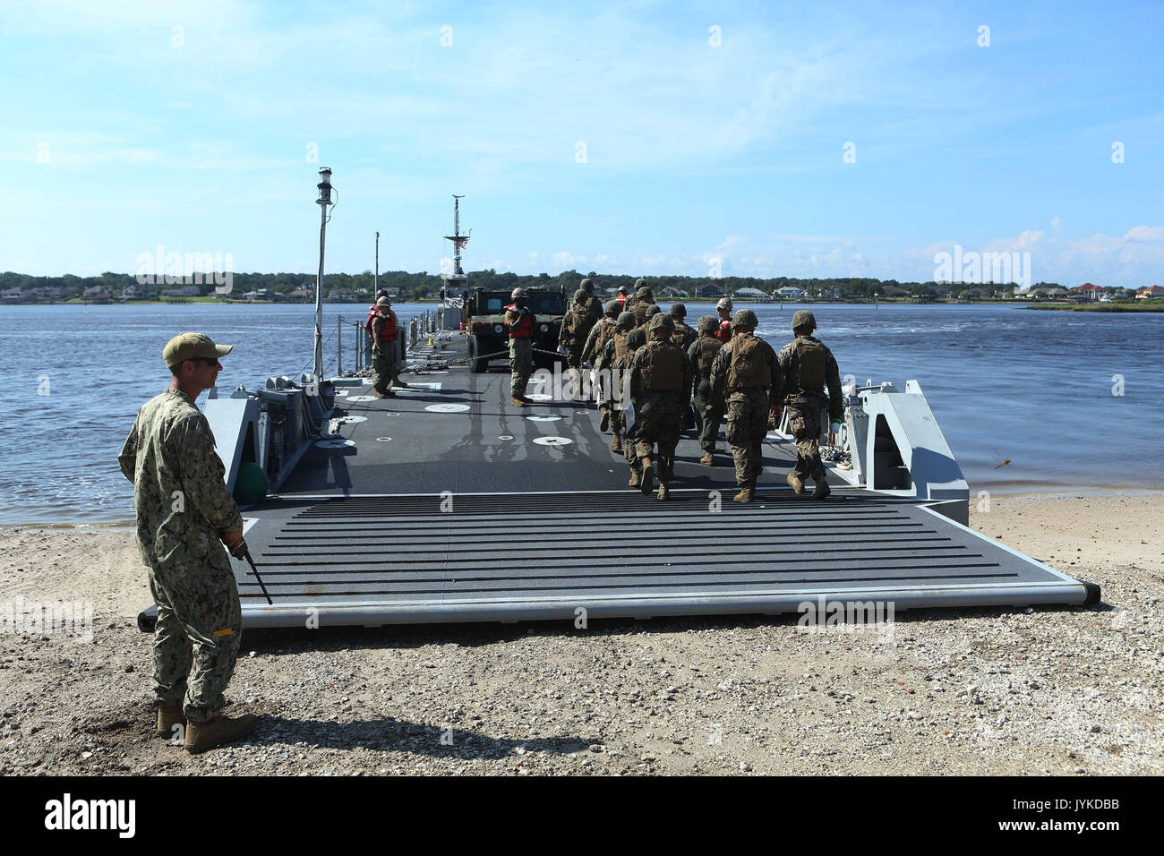 U.S. Marines and Sailors with 2nd Marine Logistics Group, prepare to ...