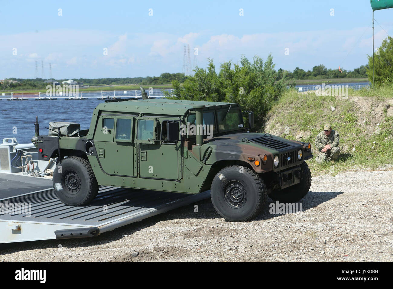 U.S. Marines and Sailors with 2nd Marine Logistics Group, offload ...