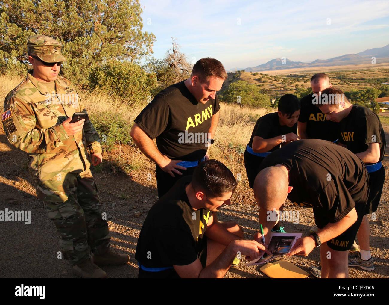 U.S. Army Intelligence Center of Excellence Students study a photograph ...
