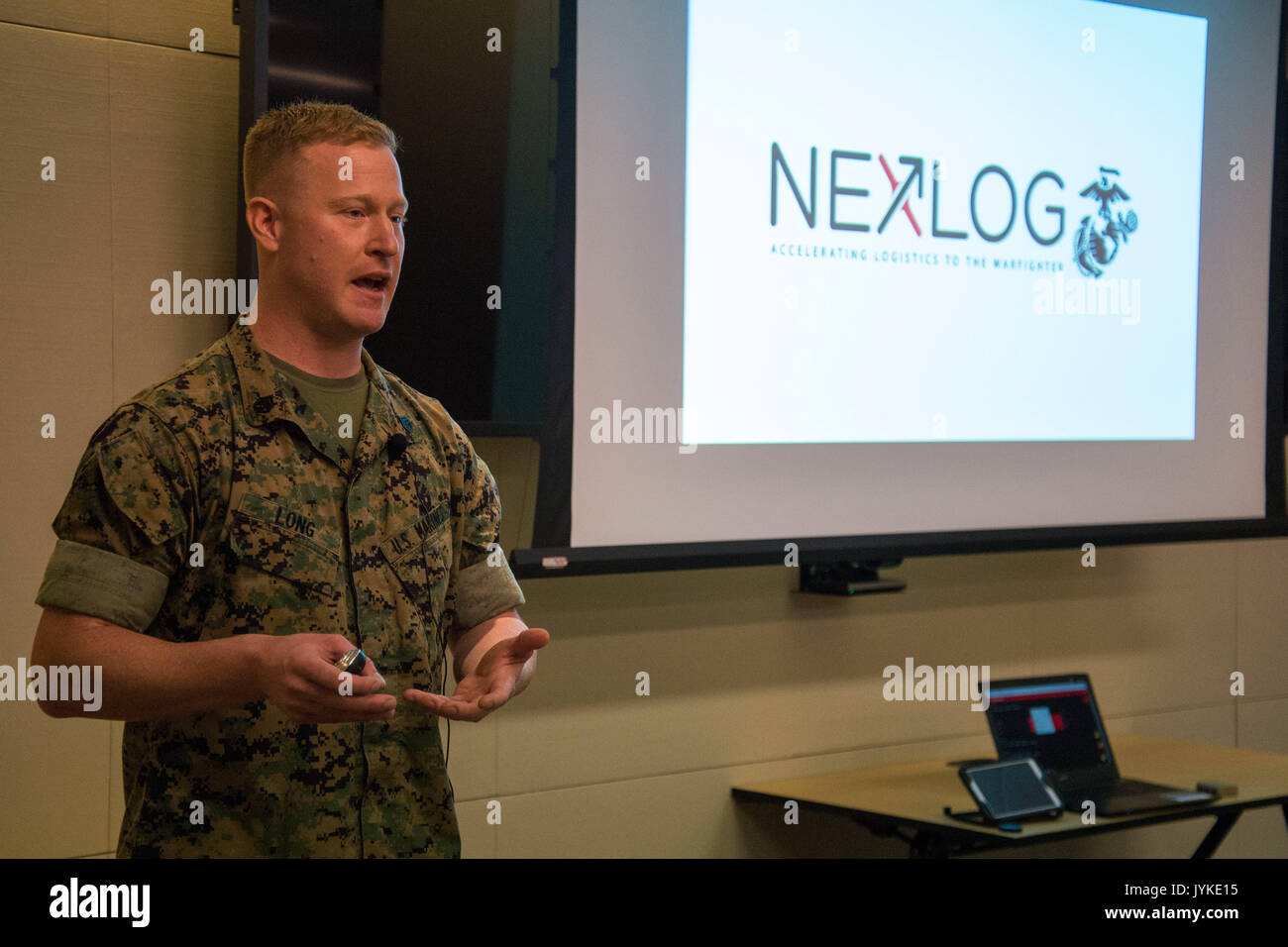 U.S. Marine Staff Sgt. Alexander Long presents his winning entry from ...