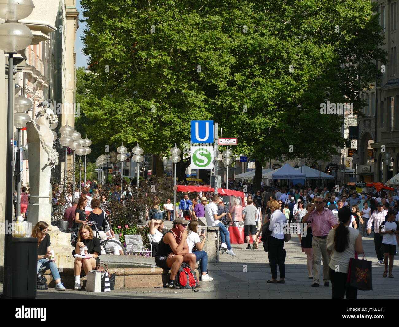 Germany Munich pedestrian zone shopping street crowded crowds tourists ...