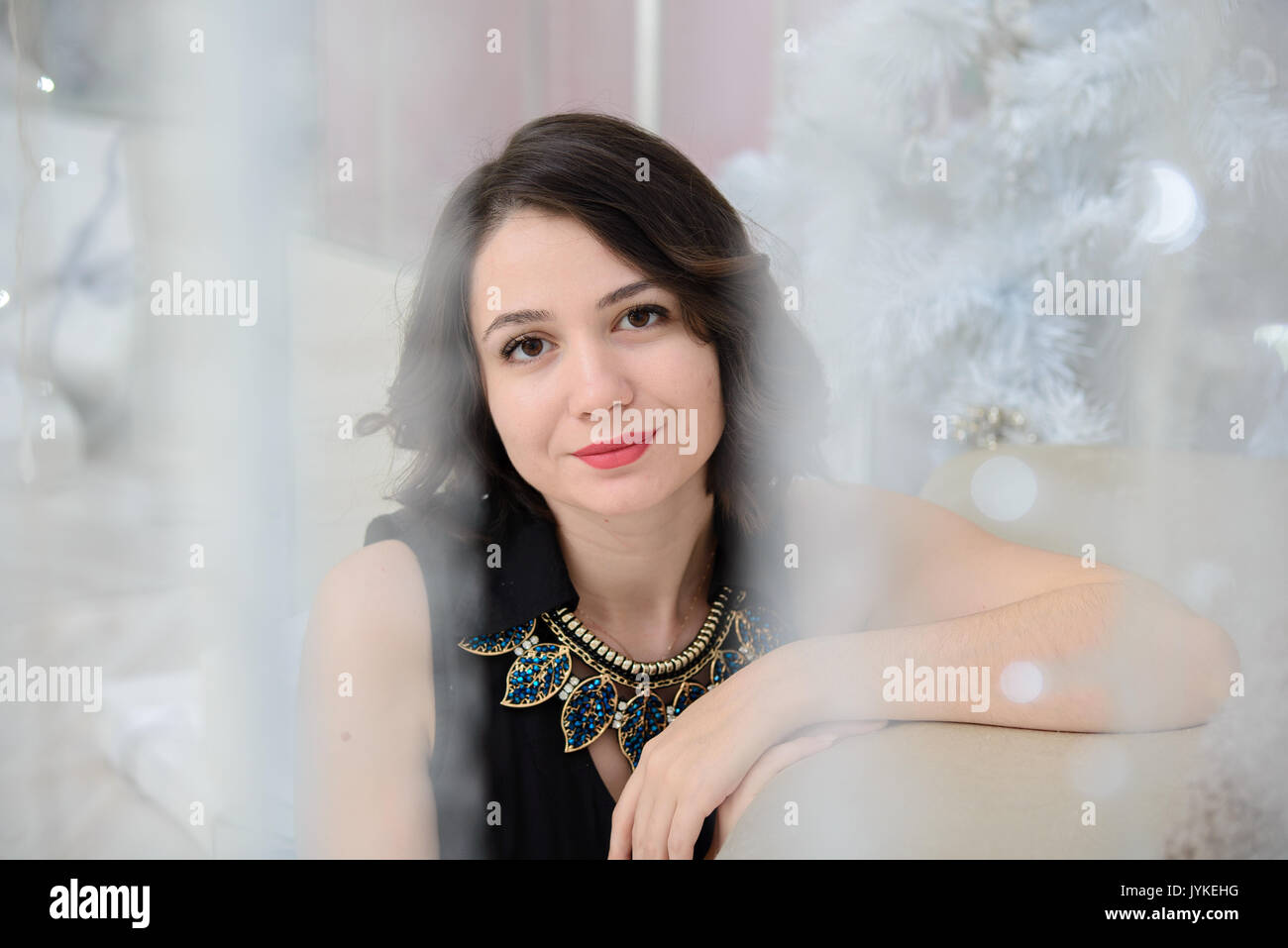 pretty girl at a photo shoot in the studio Stock Photo - Alamy