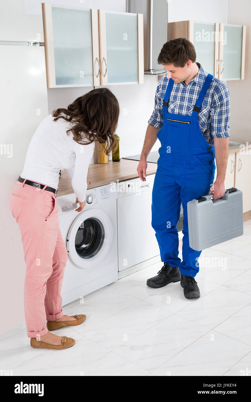 Woman washing machine defect hi-res stock photography and images - Alamy