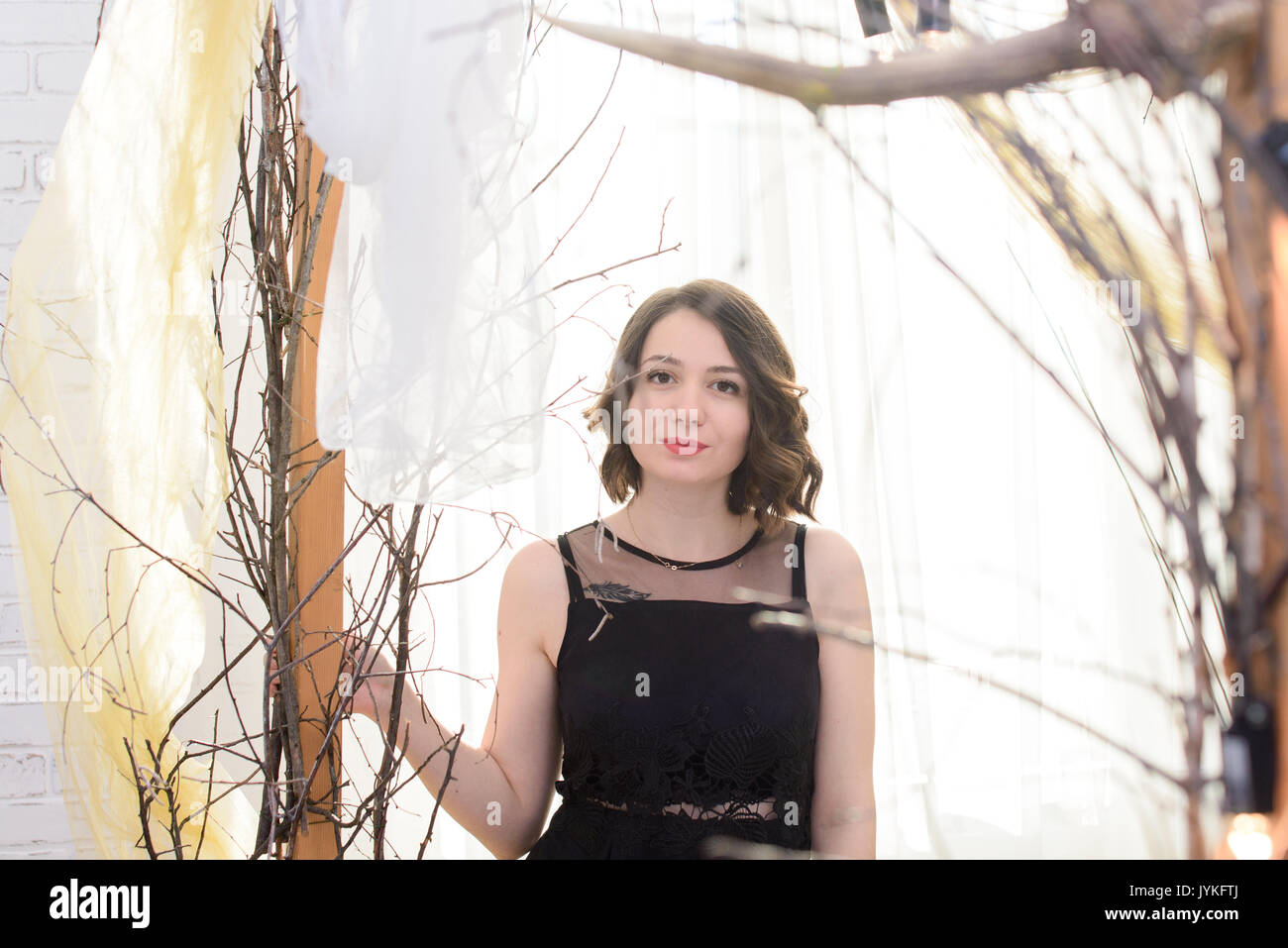 pretty girl at a photo shoot in the studio Stock Photo - Alamy