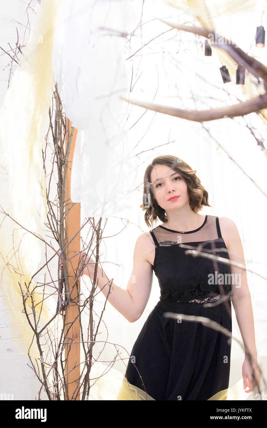 pretty girl at a photo shoot in the studio Stock Photo - Alamy