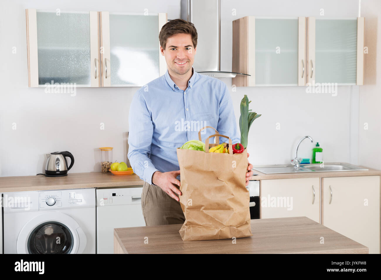 Man With Grocery Bag High Resolution Stock Photography and Images - Alamy