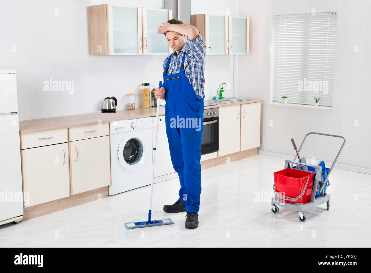 Male cleaner overall hi-res stock photography and images - Alamy