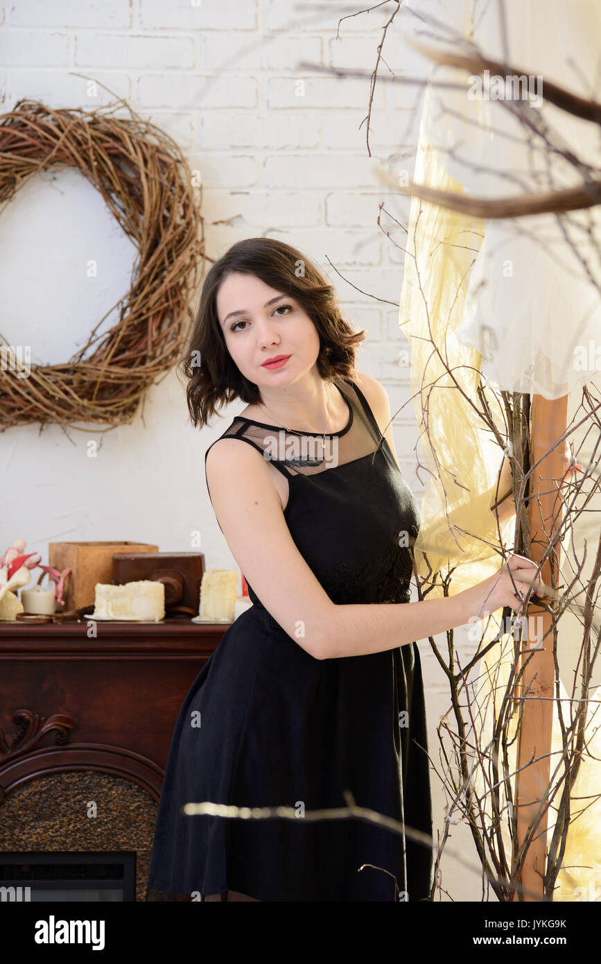 pretty girl at a photo shoot in the studio Stock Photo - Alamy