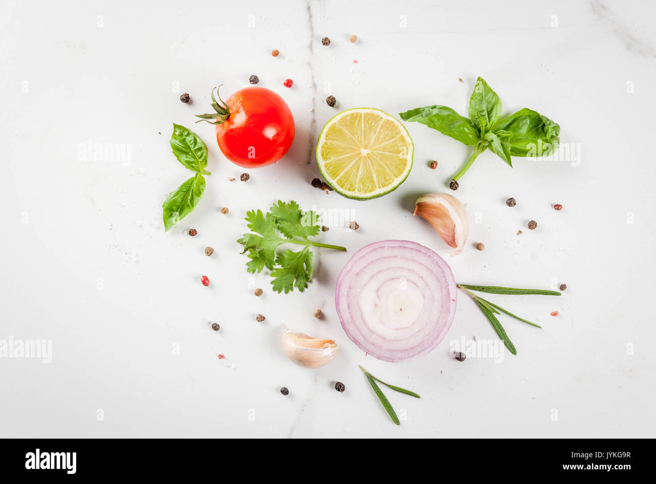 Food cooking background, white marble kitchen table. Spices and herbs ...