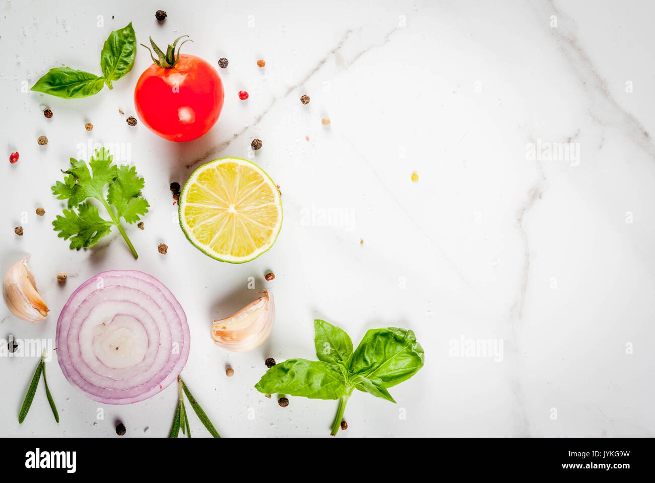 Food cooking background, white marble kitchen table. Spices and herbs ...