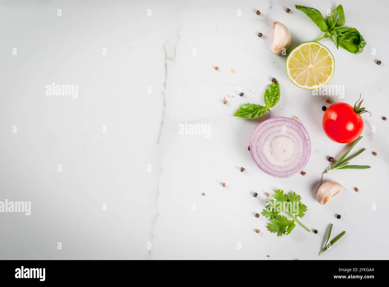 Food cooking background, white marble kitchen table. Spices and herbs ...