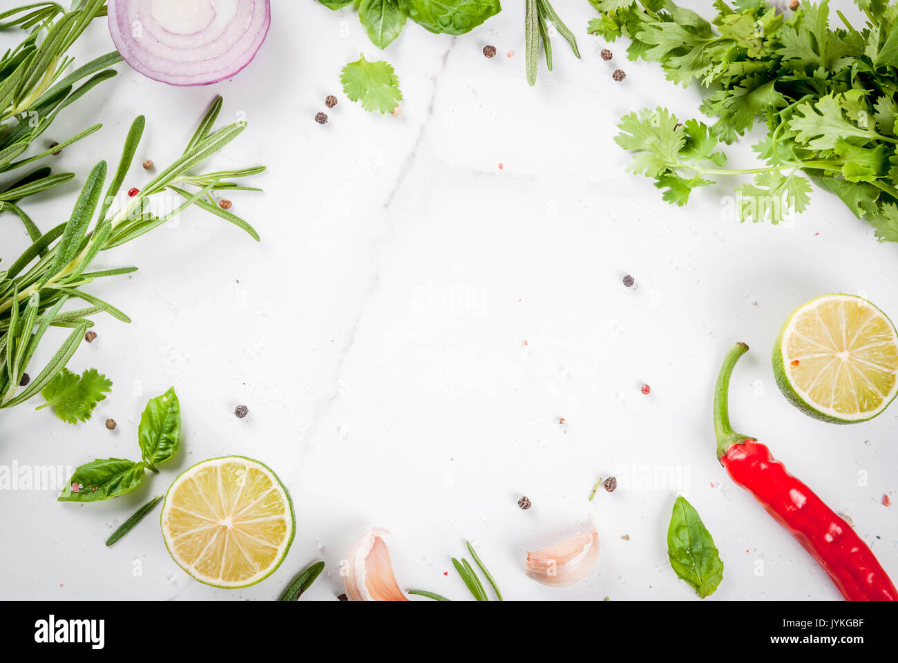 Food cooking background, white marble table. Spices, herbs for dinner ...