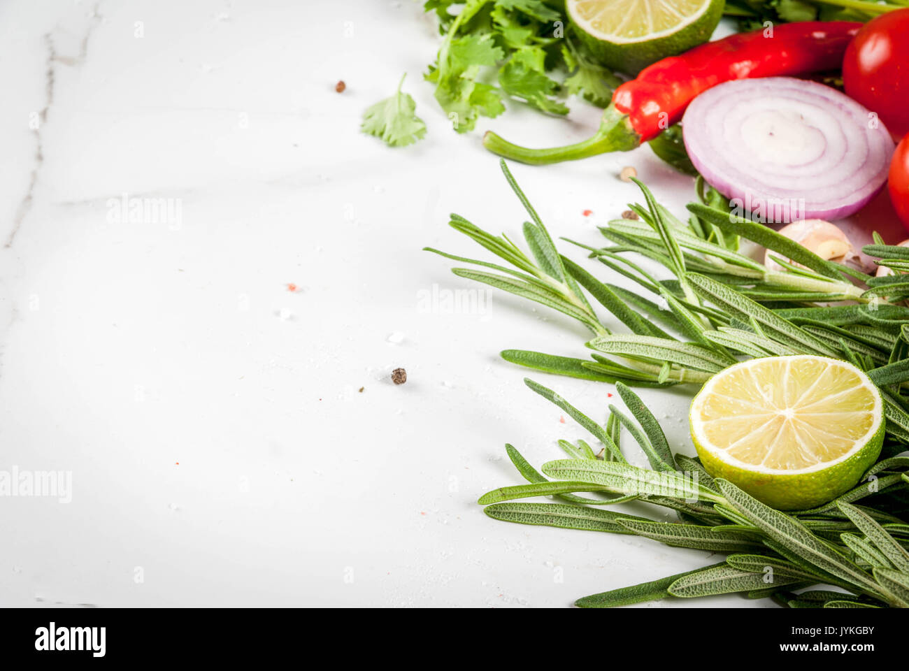 Food cooking background, white marble table. Spices, herbs for dinner ...