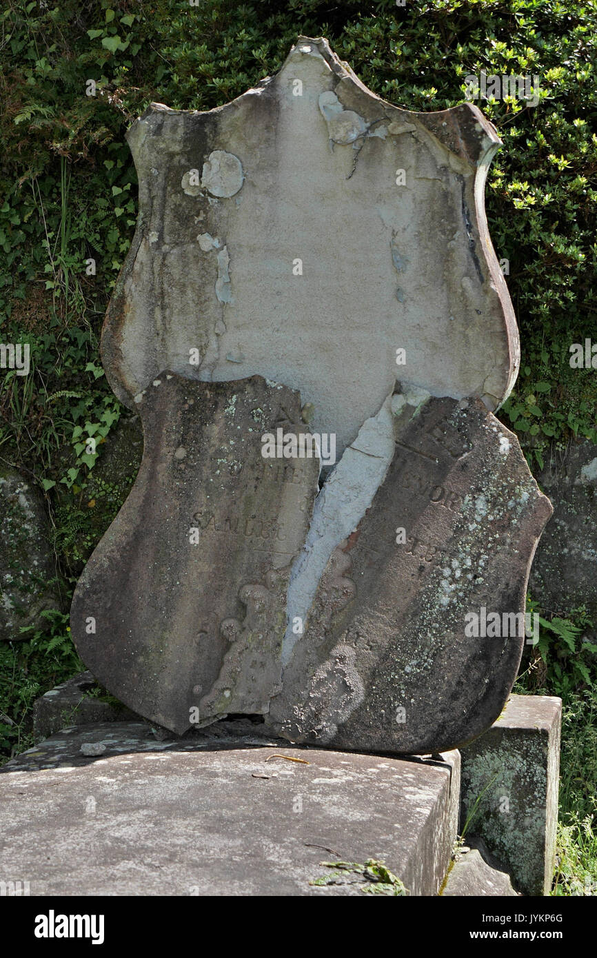A broken tombstone in the Oura international cemetery Stock Photo - Alamy