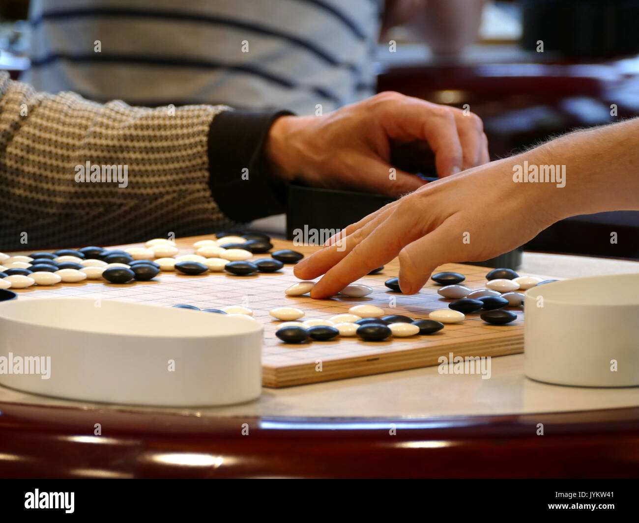 European Amateur player playing Chinese Weiqi, Japanese Go, Korean ...