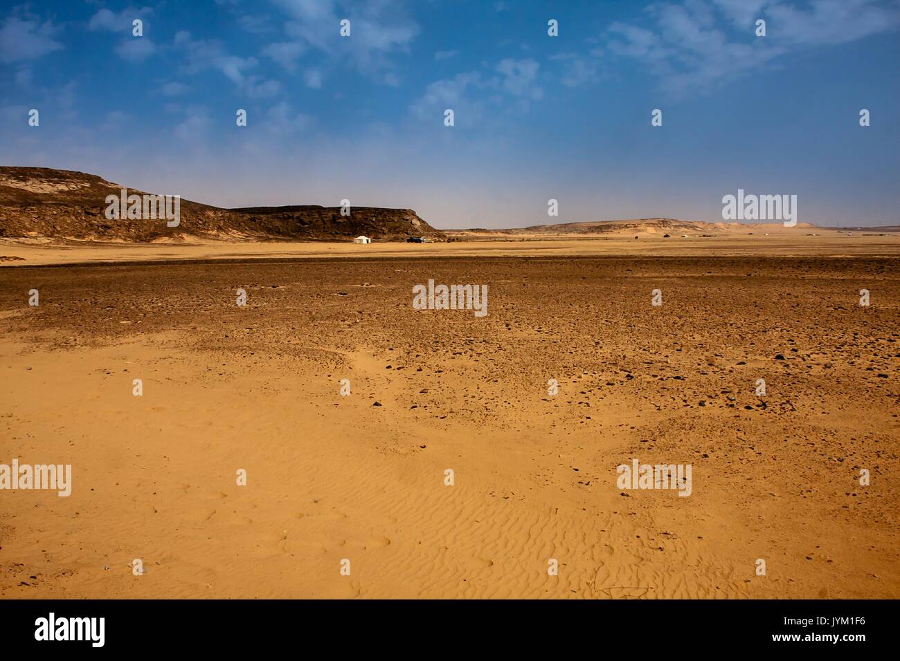 A desert landscape with Bedouin camps near Musayqirah, Riyadh Province ...