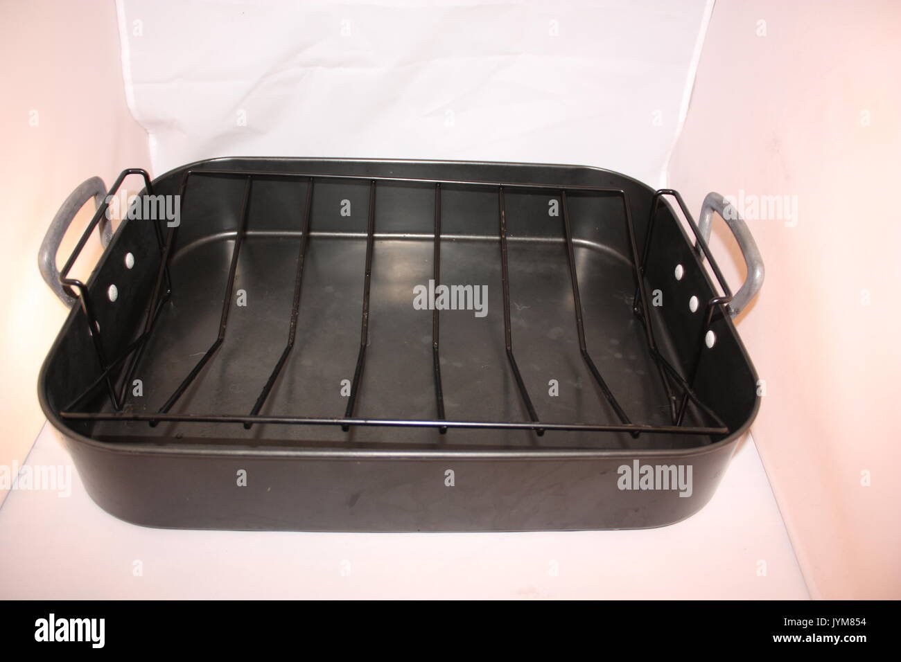 Oven tray to roast meat Stock Photo - Alamy