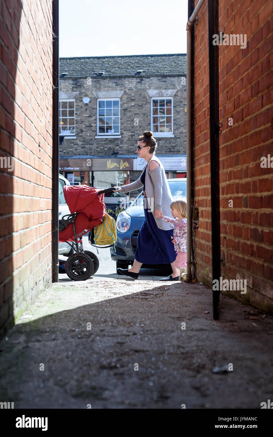 Woman pushing a pram hi-res stock photography and images - Alamy