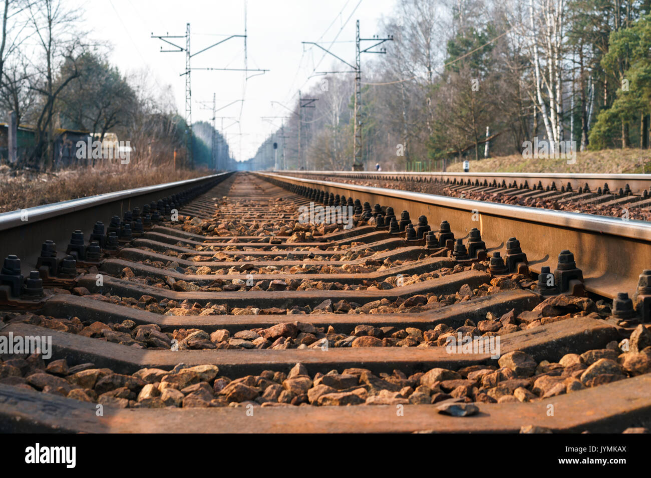 railway tracks Leaving into the distance closeup Stock Photo - Alamy