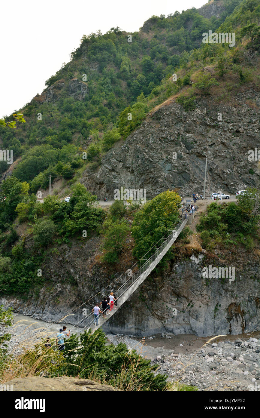 Zarnava suspension footbridge across Girdimancay river near Lahic Stock ...
